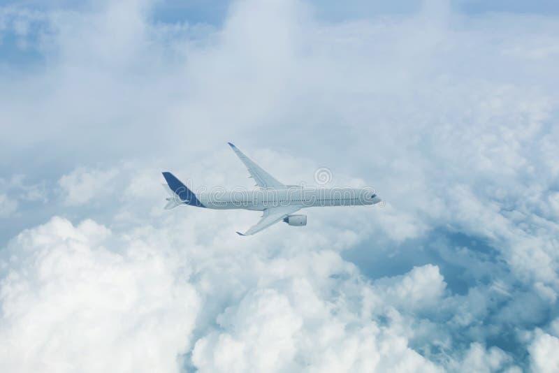 Passenger Plane Flies High Above the Clouds Aerial View Stock Image ...