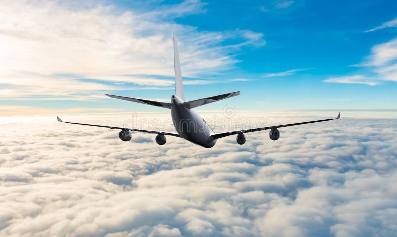 Passenger Plane in Flight. Aircraft Fly High in the Blue Sky Over the ...