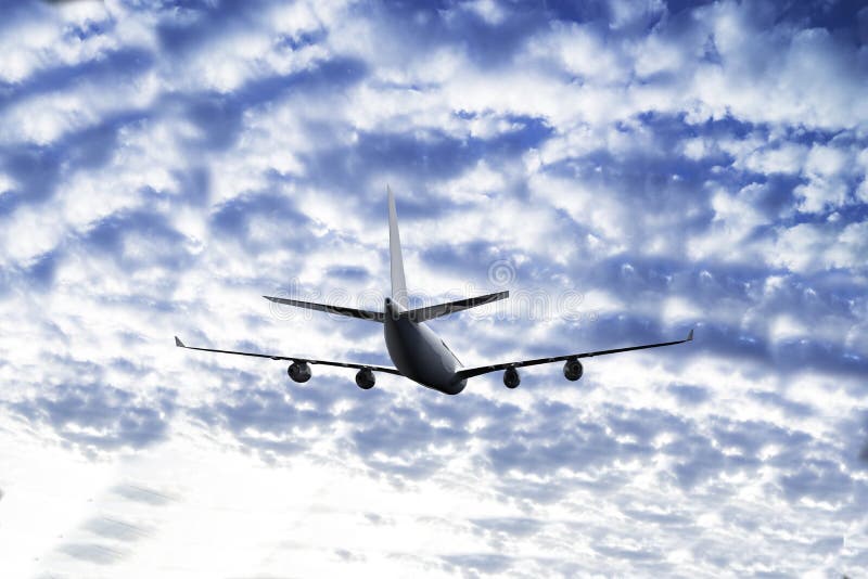 Passenger Plane in Flight. Aircraft Fly High in the Blue Sky Over the ...