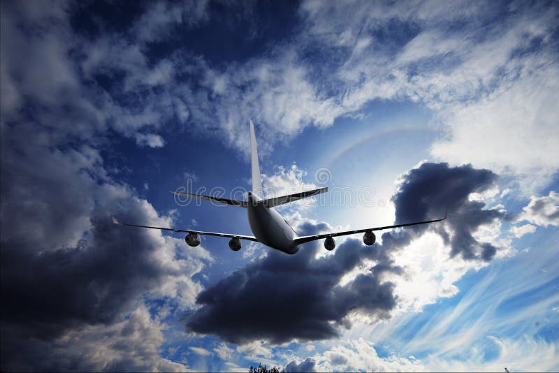 Passenger Plane in Flight. Aircraft Fly High in the Blue Sky Over the ...