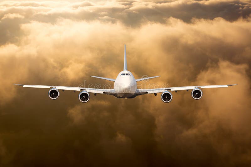 Passenger Plane in Flight. Front View. Sunset Time Stock Photo - Image ...