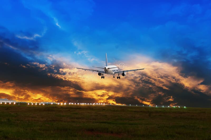Passenger Plane Fly Down Over Take-off Runway from Airport Stock Image ...