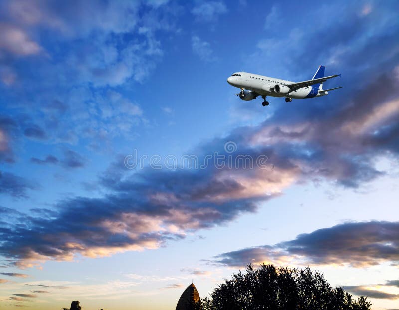 A Passenger Plane is Flying in a Beautiful Blue Sky with White Clouds ...