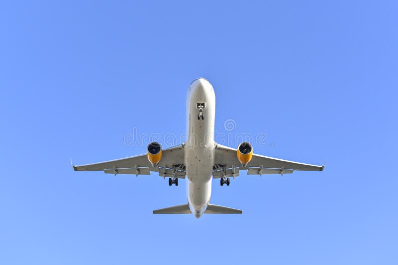 Passenger plane on landing stock photo. Image of airplane - 185365414