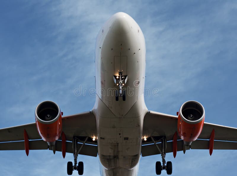 Passenger Plane Landing Overhead Stock Photo - Image of aviation ...