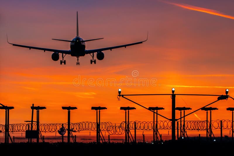 Passenger Plane Landing during Sunset Stock Image - Image of colours ...