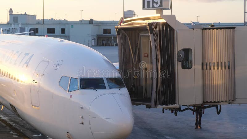 Passenger Plane Moored at the Exit and Ready To Board Flying Passengers ...
