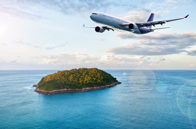 Passenger Plane Over Tropical Island Stock Image - Image of remote ...