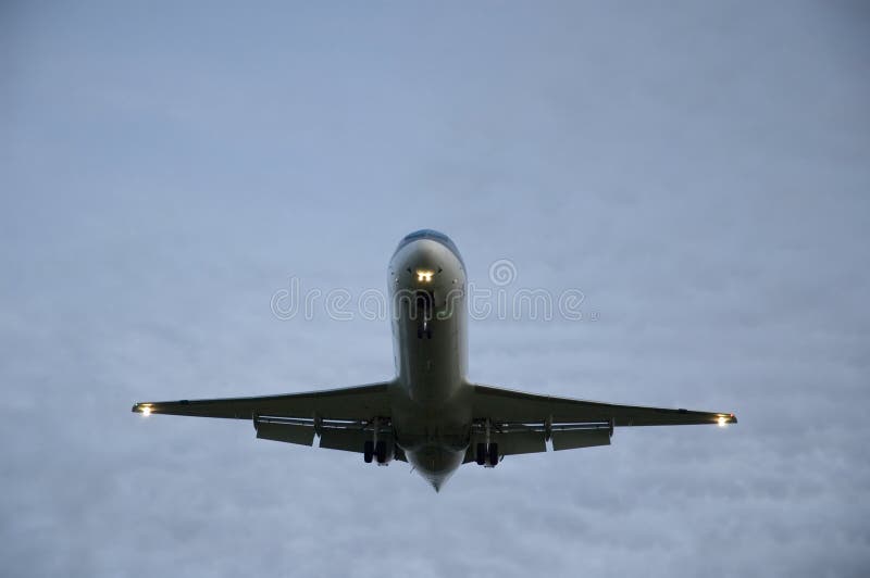 Passenger plane overhead. stock image. Image of transport - 1921613
