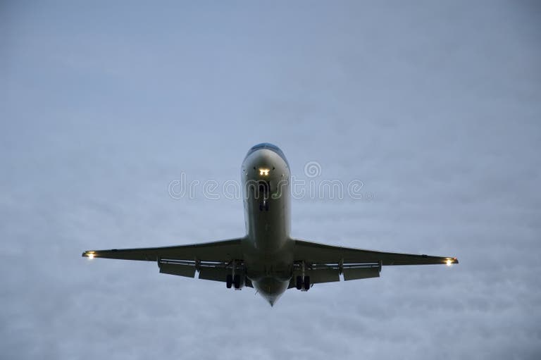 Passenger plane overhead. stock image. Image of transport - 1921613