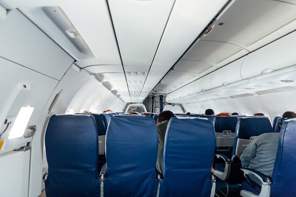 Passenger Plane with People in Flight Stock Image - Image of airplane ...