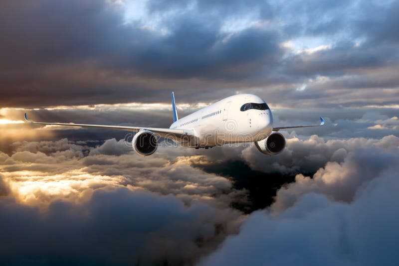 Passenger Plane Flying High Above the Storm Clouds Stock Photo - Image ...