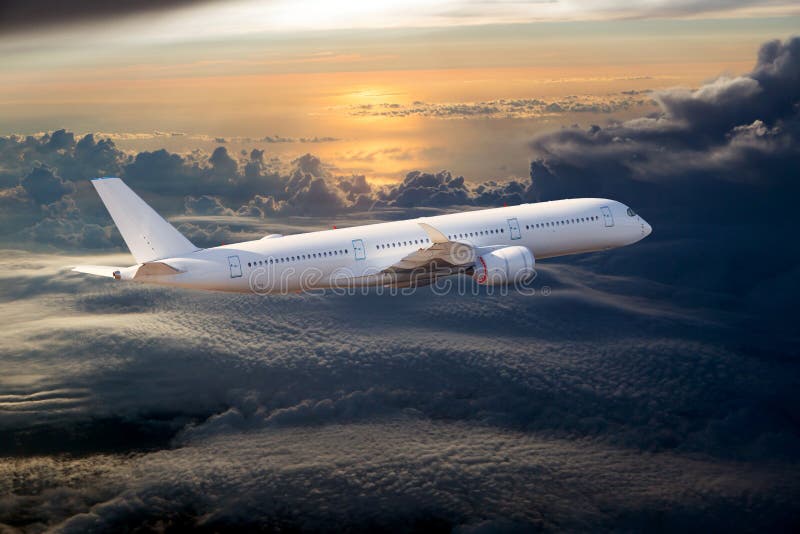 Passenger Plane Flying High Above the Sunset Clouds Stock Image - Image ...