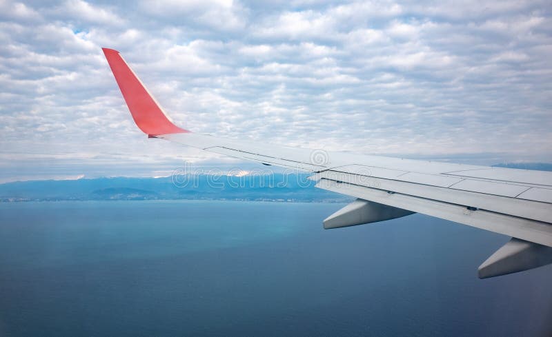 Passenger plane in the sky stock image. Image of horizontal - 255361859