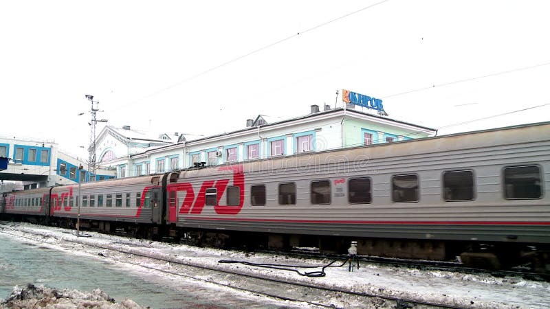 A Passenger Railway Train Stands on the Platform of the Station in ...
