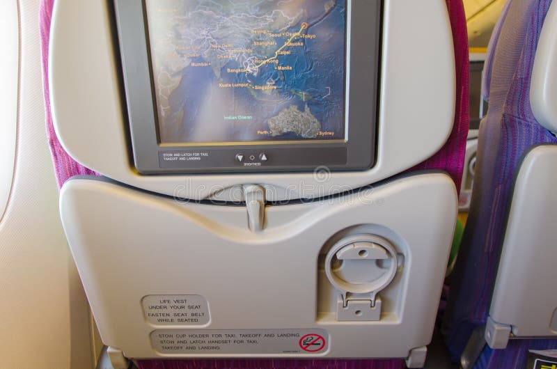 Passenger Seat of Plane with Screen Map Stock Photo - Image of ...