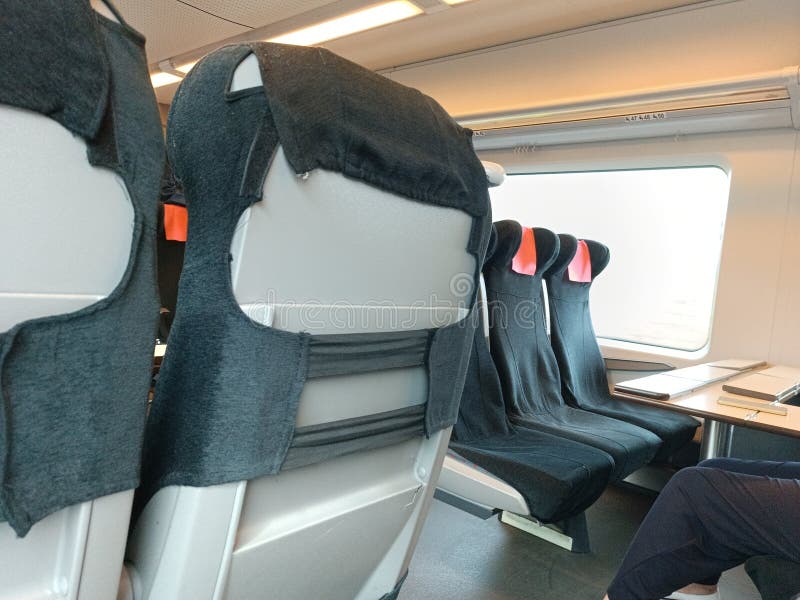 Passenger Seats in an Electric Train in Black Covers. Electric Train ...