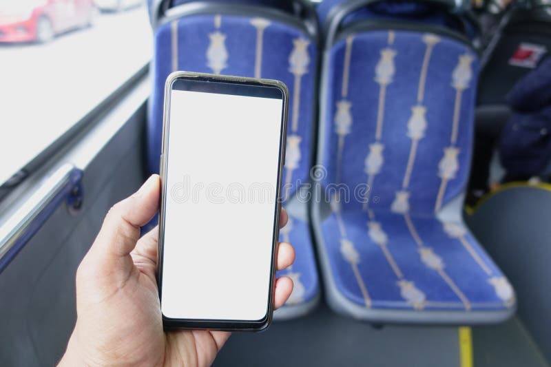 Passenger Sitting in a Bus Using His Phone. Stock Photo - Image of ...