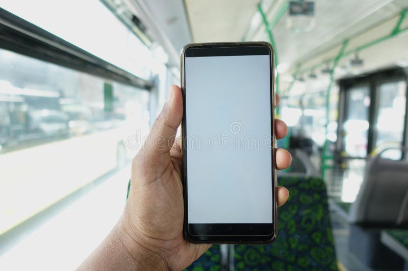 Passenger Sitting in a Bus Using His Phone. Stock Photo - Image of ...