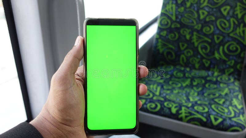 Passenger Sitting in a Bus Using His Phone with Green Screen Stock ...