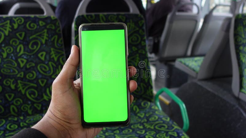 Passenger Sitting in a Bus Using His Phone with Green Screen Stock ...