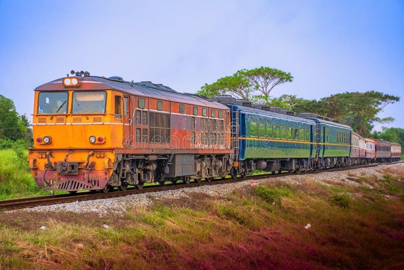 Passenger Train by Diesel Locomotive on the Railway. Stock Photo ...