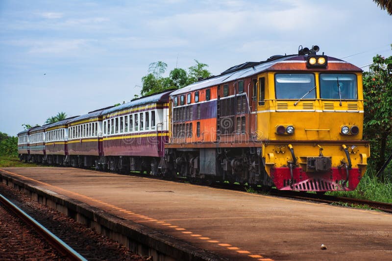 Passenger Train by Diesel Locomotive on the Railway. Stock Photo ...