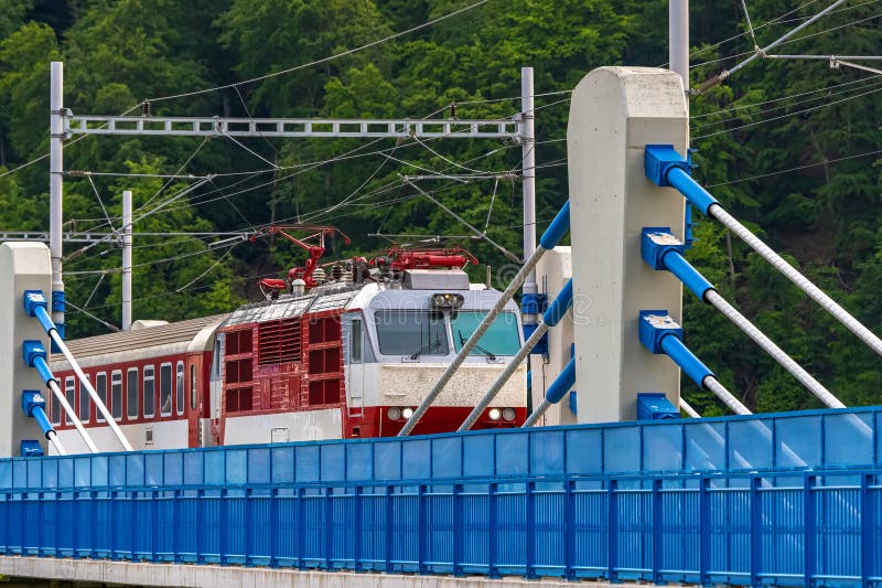 A passenger train stock image. Image of rail, bridge - 321961719