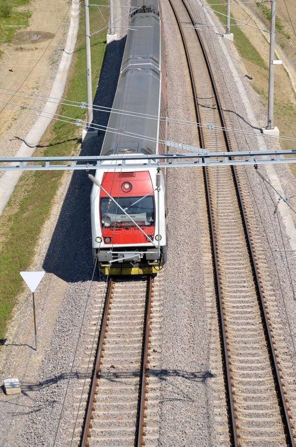 Passenger Train in Motion on Electric Railway, Above View Stock Photo ...