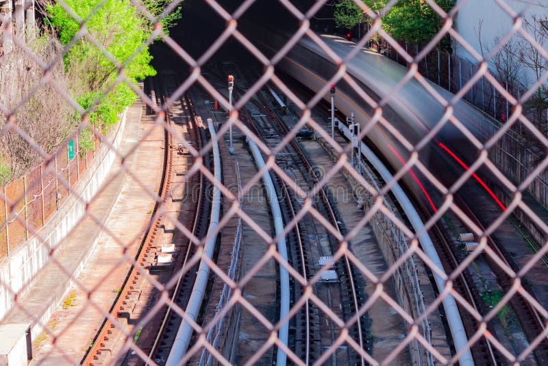 Passenger Train Moving Quickly into Underground Tunnel Stock Photo ...