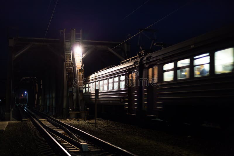 Passenger Train is Passing Over Bridge at Night Editorial Image - Image ...