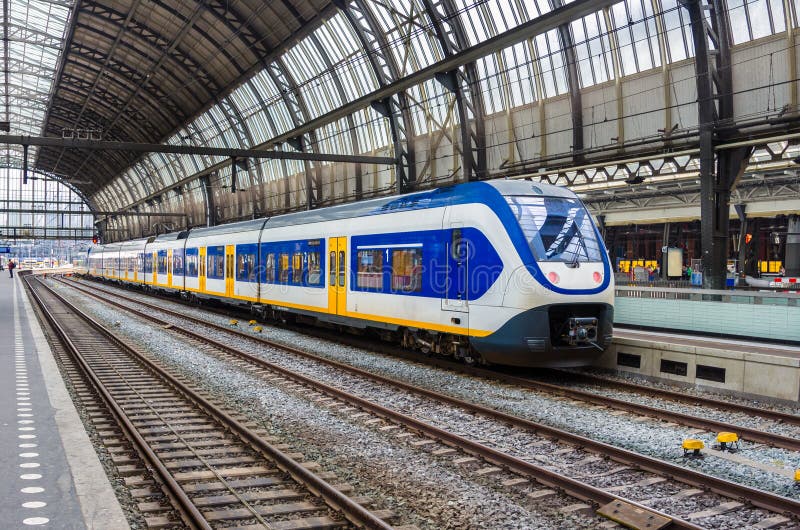 Passenger Train at Platform Stock Photo - Image of commuter, colourful ...
