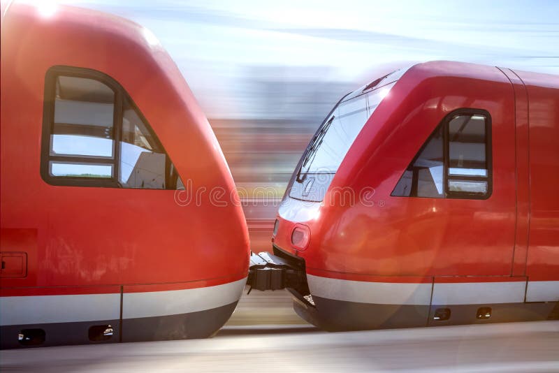 Passenger Train Speeding through a Train Station Stock Photo - Image of ...