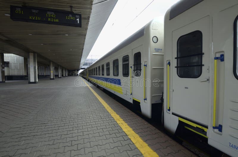 Passenger Train Standing on Rail Tracks, an Empty Platform. Grand ...