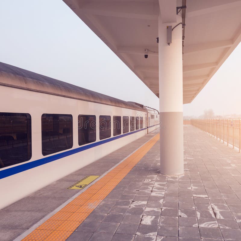 Passenger Train Stands by the Platform Stock Image - Image of dawn ...