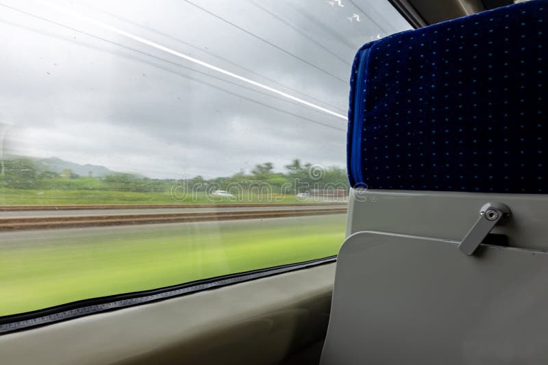 Passenger Train Window View during Daytime with Motion Blur Stock Photo ...