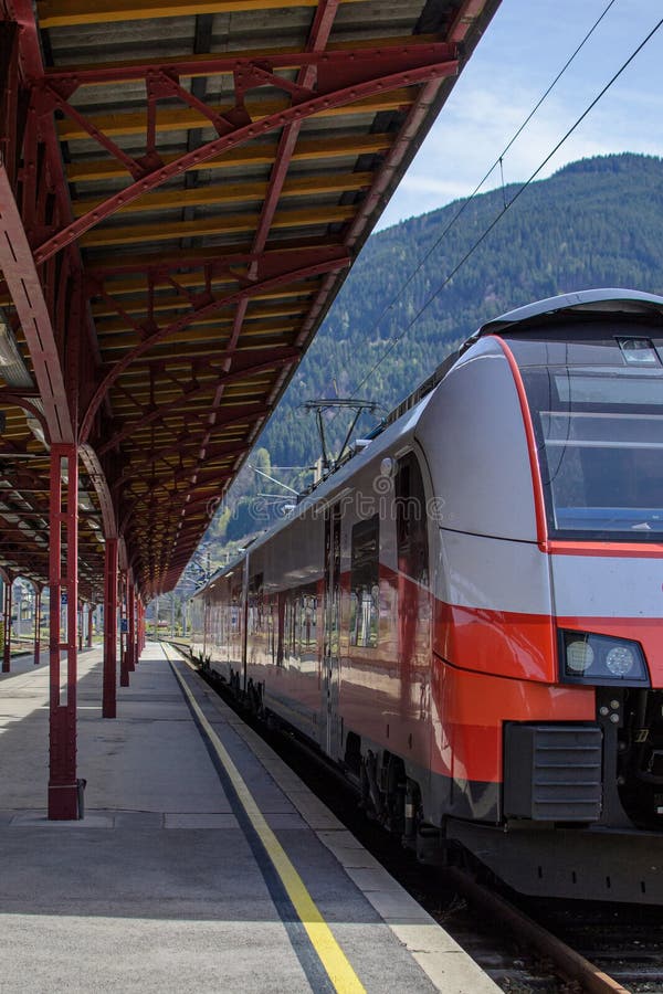 Passenger Trains Awaiting Departure on a Railway Platform Stock Image ...