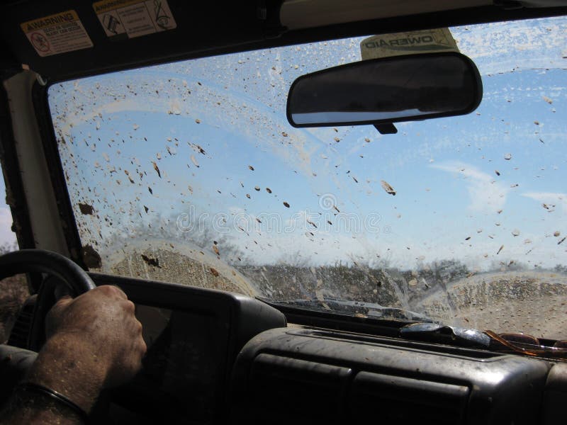 Passenger View of Driver Hand and Muddy Windshield Stock Image - Image ...