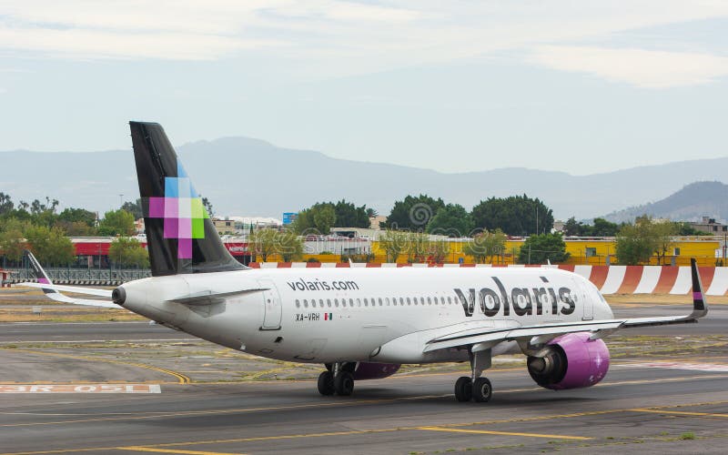 Passenger Volaris Plane Parked on an Airport Runway Editorial Stock ...