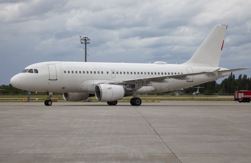 Passenger White Plane at the Airport. Place for Text. Clouds Sky Stock ...