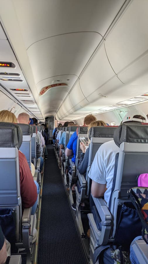 Passengers on an Airplane editorial photography. Image of metro - 238148397