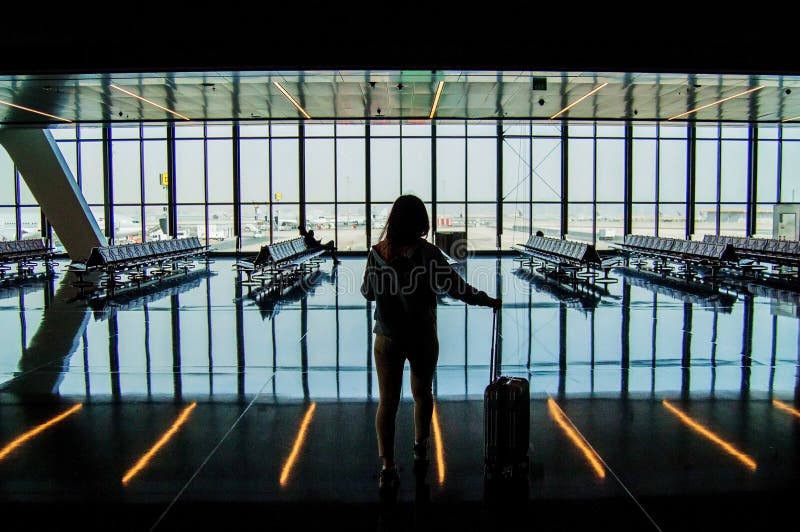 Passengers at the Airport Window. Stock Photo - Image of leave ...