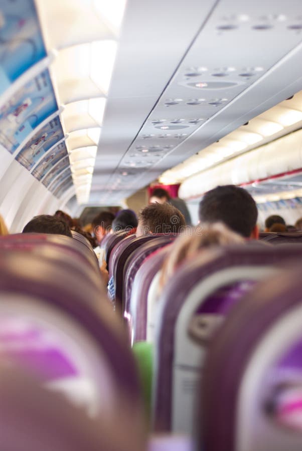 Passengers on Chairs in Airplane Stock Photo - Image of arrive ...