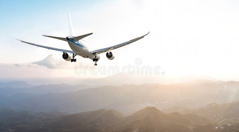 Passengers Commercial Airplane Flying Above Mountains Stock Photo ...