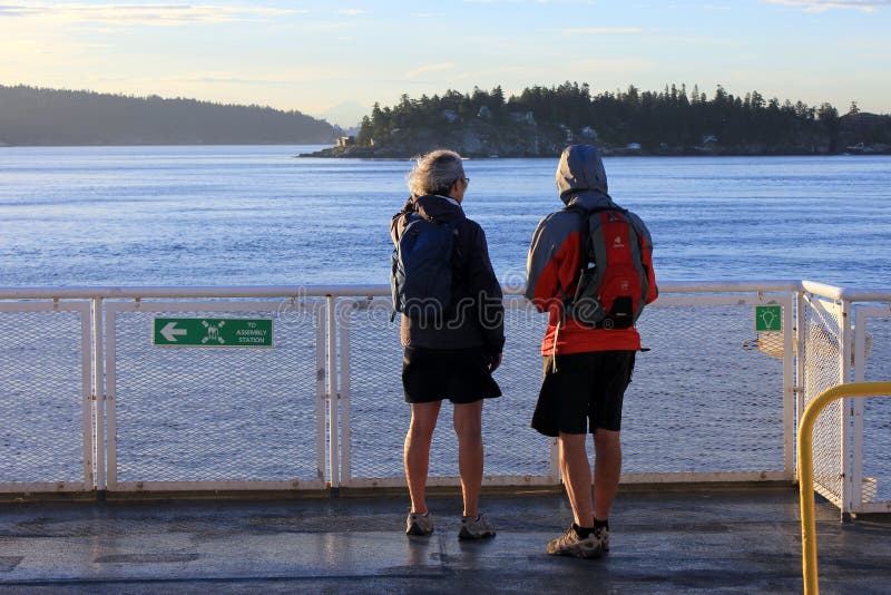 Passengers on the Deck of the BC Ferry Near Vancouver with Mountains ...
