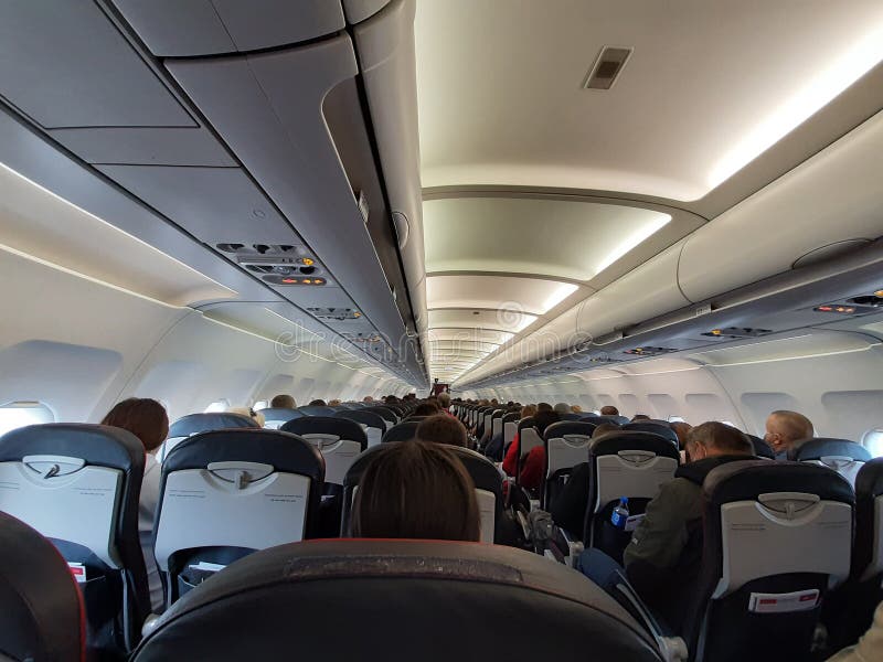 Passengers on the plane editorial photo. Image of aircraft - 202546856