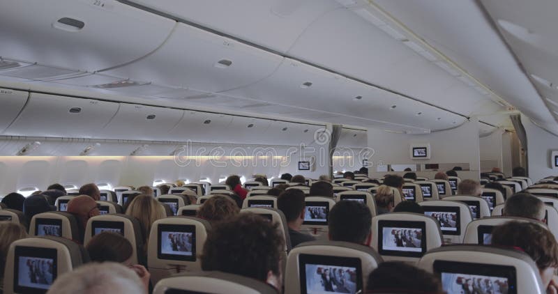 Passengers on the Plane Look at the Safety Instructions Stock Video ...