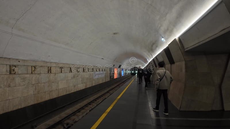 Passengers Standing on the Station Platform Waiting for the Train in an ...
