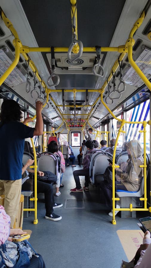 Passengers on a Trans Jakarta Bus during the Day, Jakarta, Indonesia ...