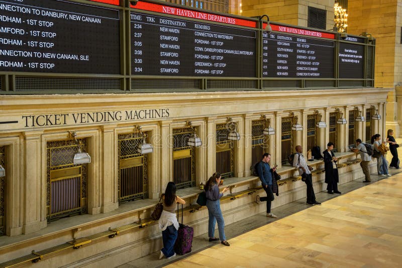 Passengers Wait by the Ticket Vending Machines Inside Grand Central ...